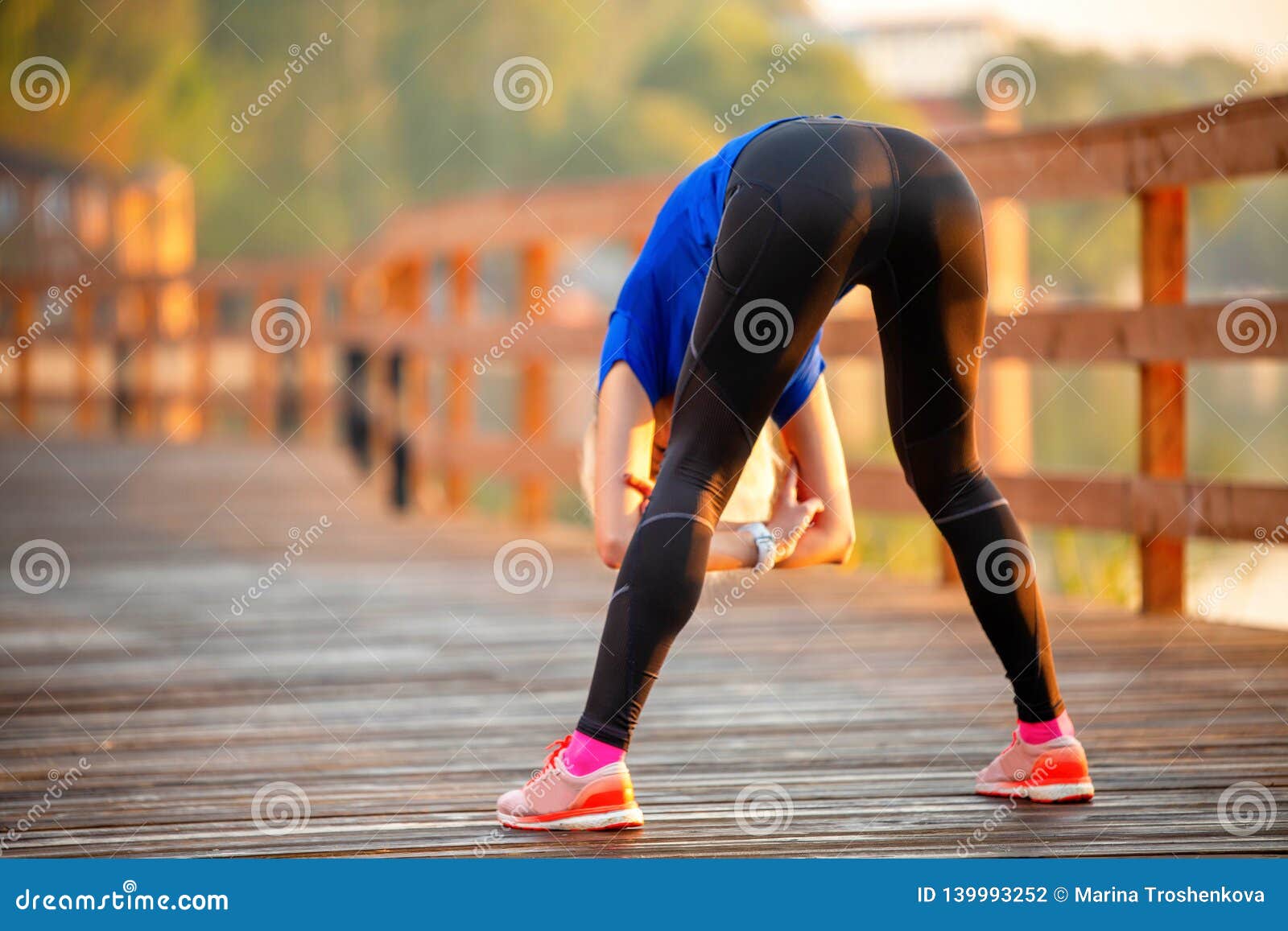 Image of Young Girl Stretching in Summer Park Stock Photo - Image of ...