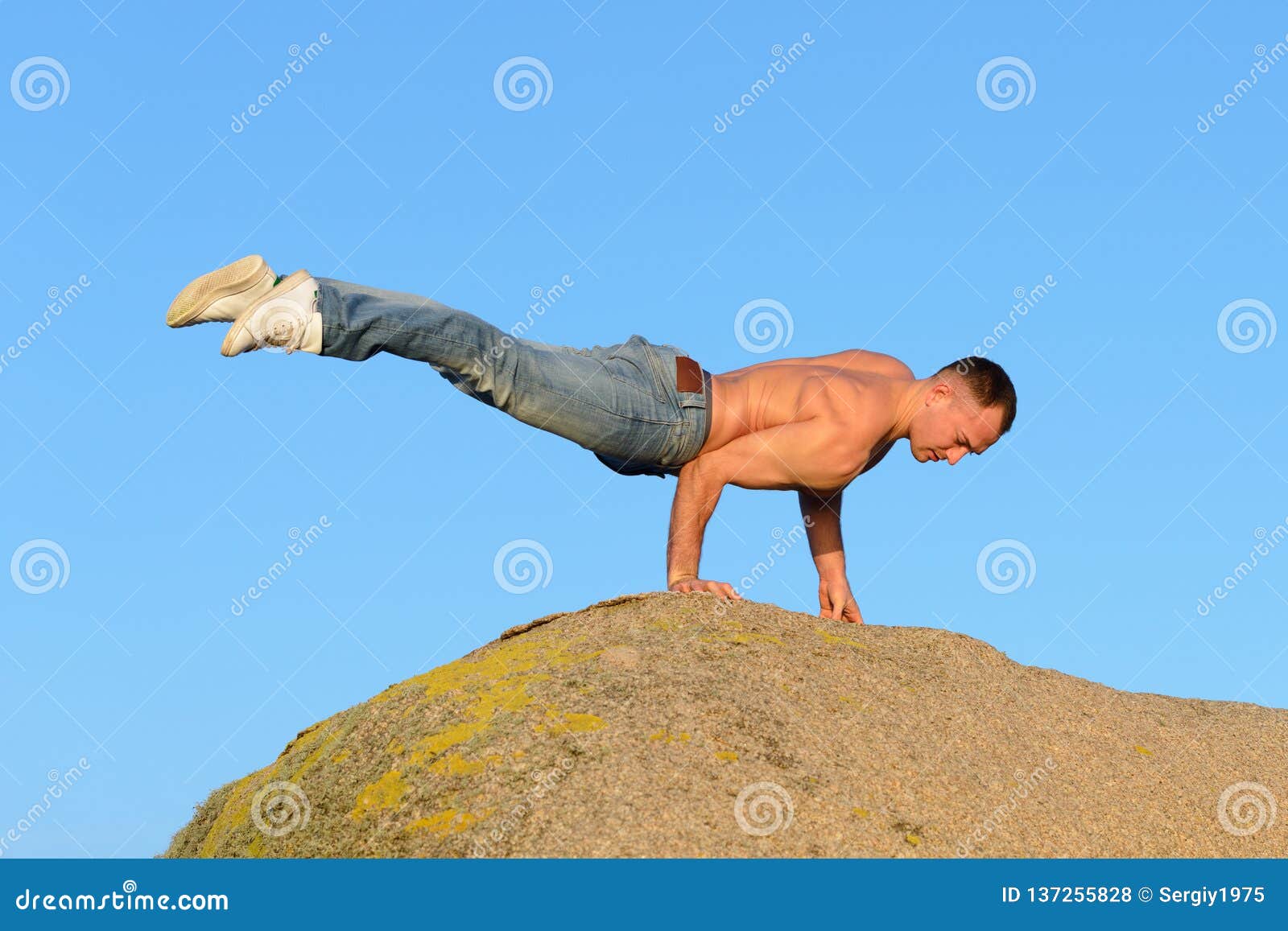 Young Man Doing Handstand on the Rock Stock Photo - Image of hand ...
