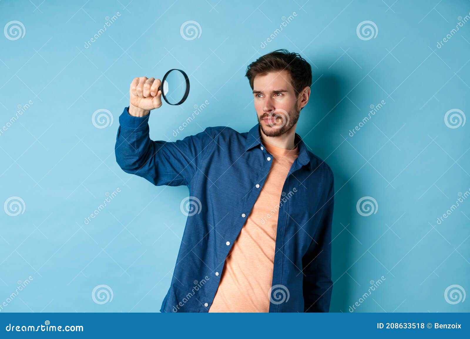 Image of Young Man Searching for Something, Looking at Empty Space with ...