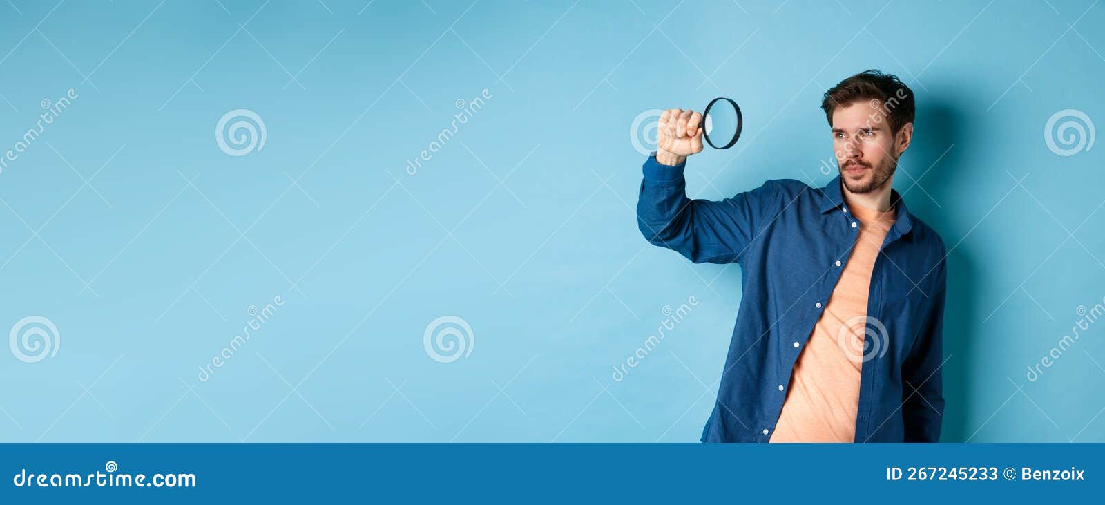 Image of Young Man Searching for Something, Looking at Empty Space with ...