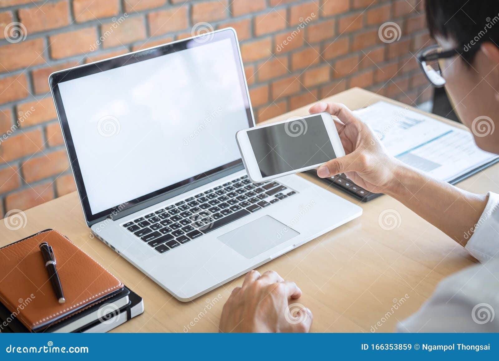 Image of Young Man Working in Front of the Laptop Looking at Screen ...