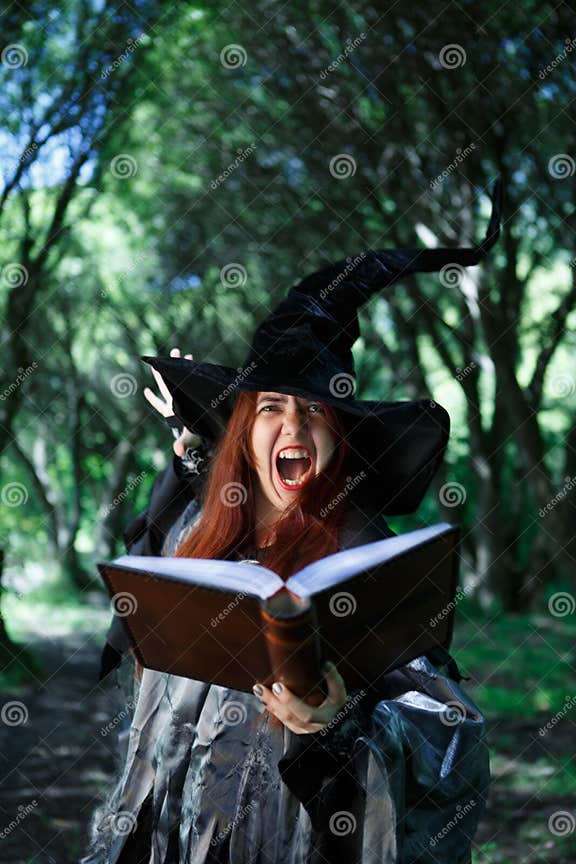 Image of Young Screaming Witch Stock Image - Image of attractive, hood ...