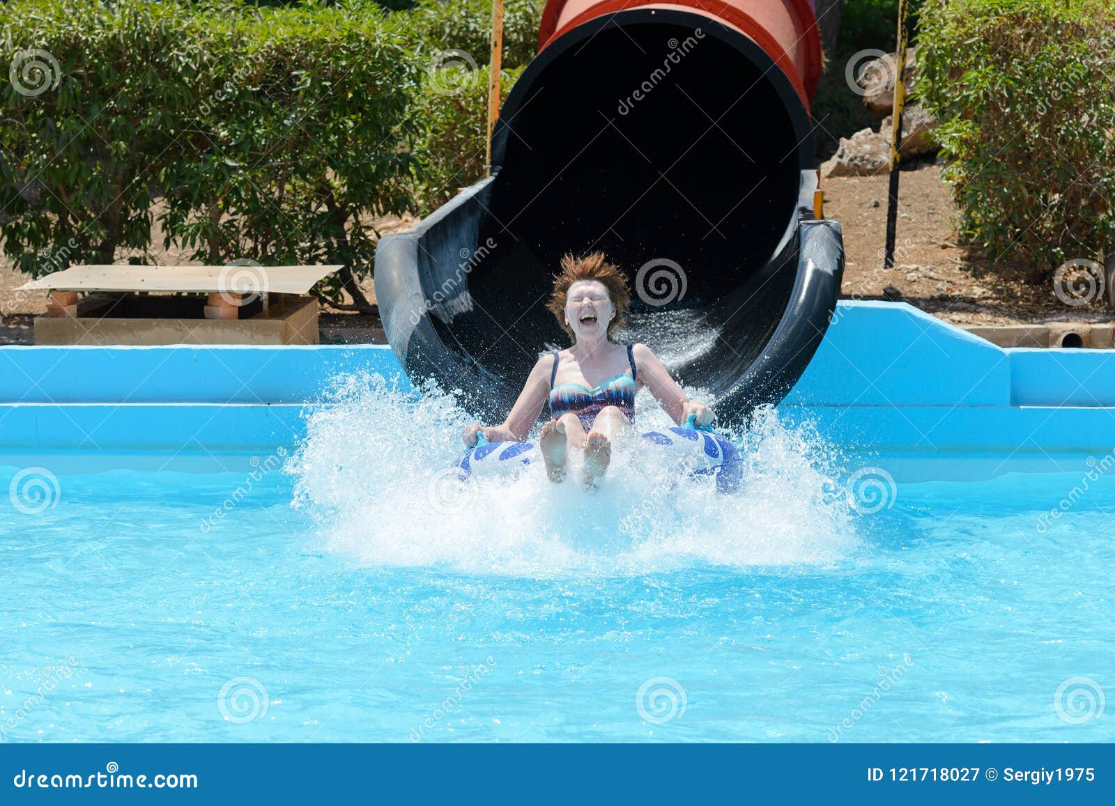 Young Woman Ride on a Slide in a Water Park Stock Image - Image of aqua ...