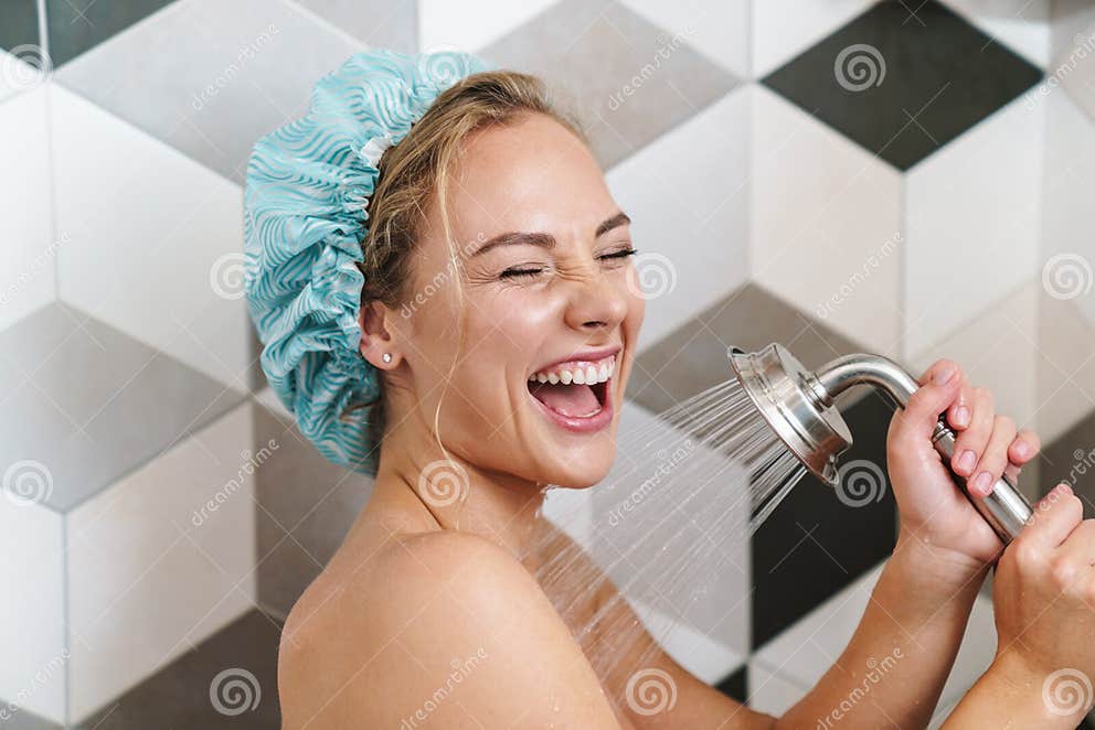 Image Of Young Woman Smiling While Taking Shower In Bathroom At Home Stock Image Image Of