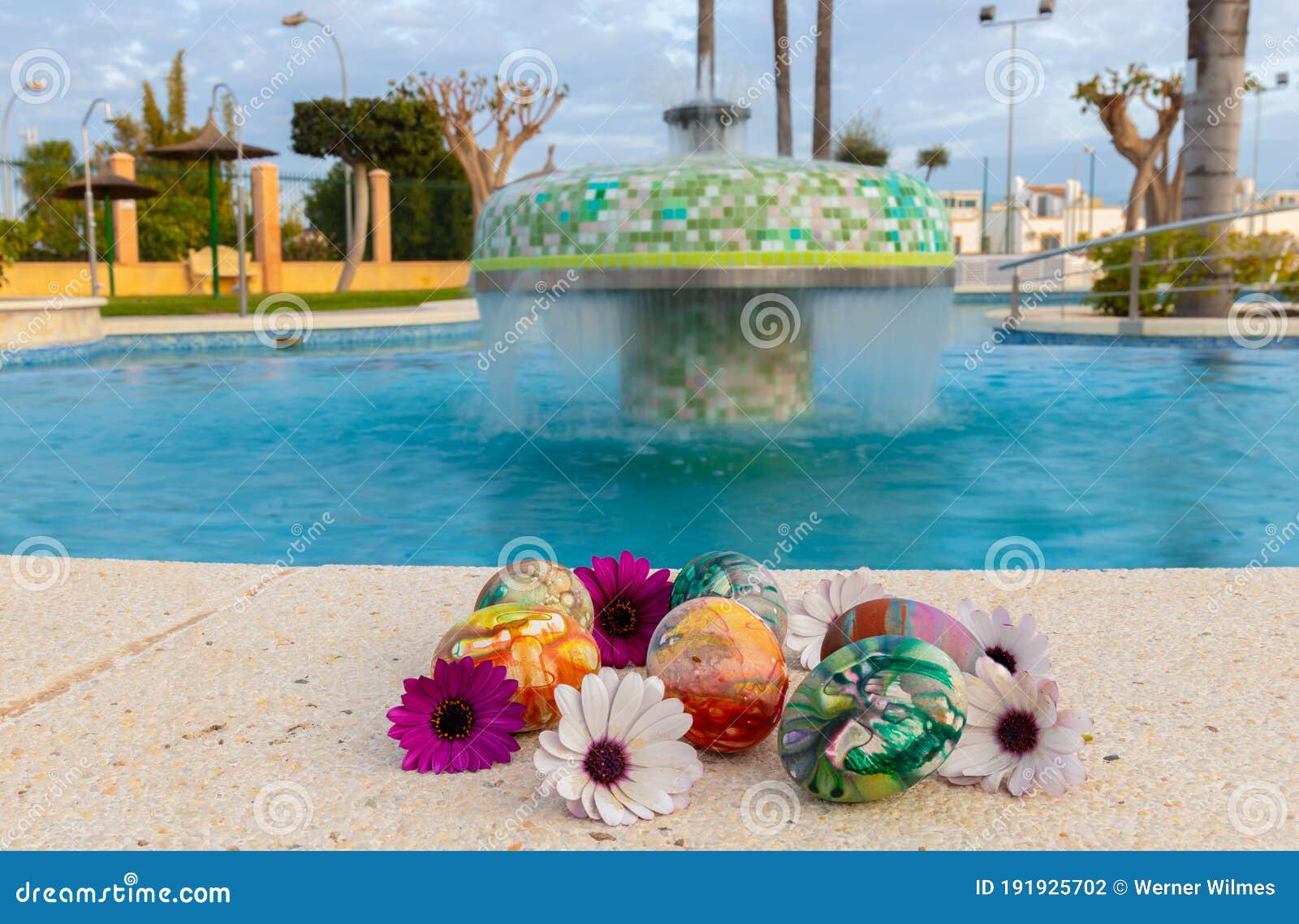Imaginatively Painted Easter Eggs on the Pool Edge of a Swimming Pool ...