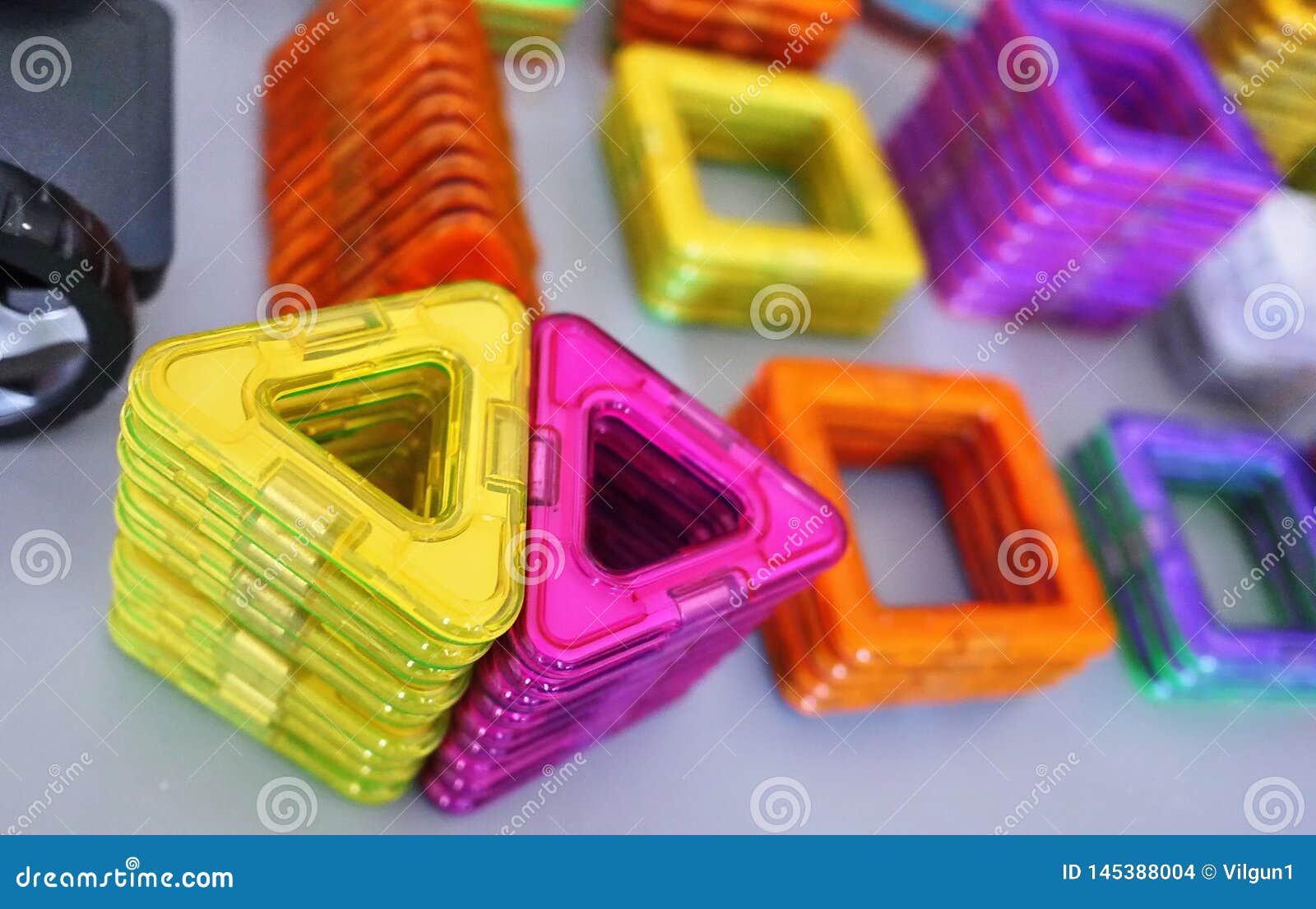 Bright Geometric Shapes on a Magnetic Base. of these Figures, the ...