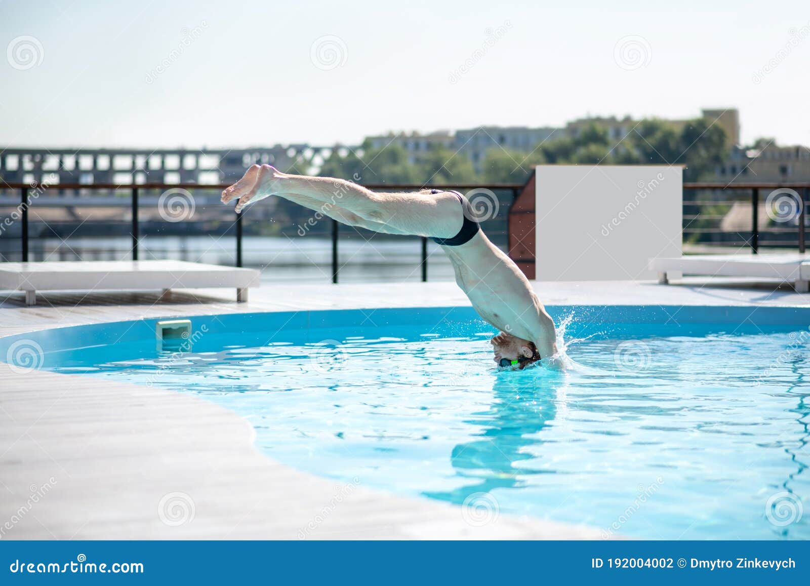 Man in the Process of Diving in Swimming Pool Stock Photo - Image of ...