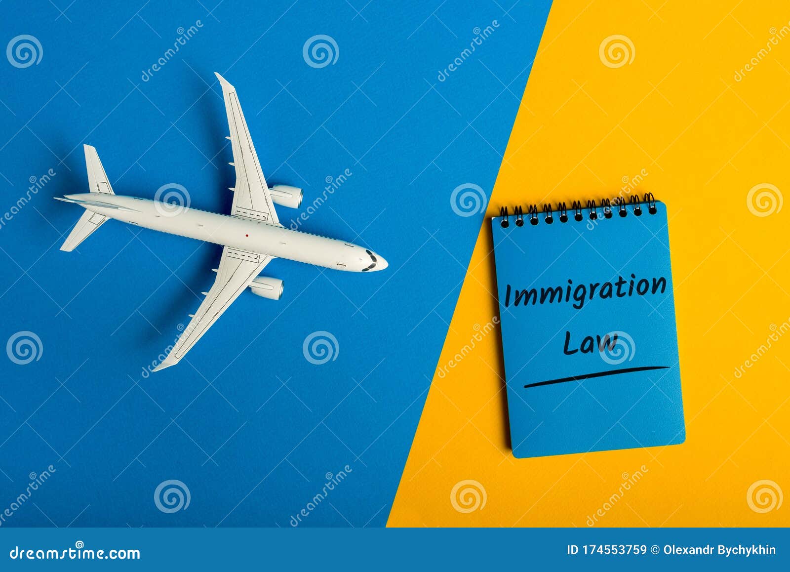 Immigration Law. MEssage in Notepad Near Airplane Model Stock Image ...