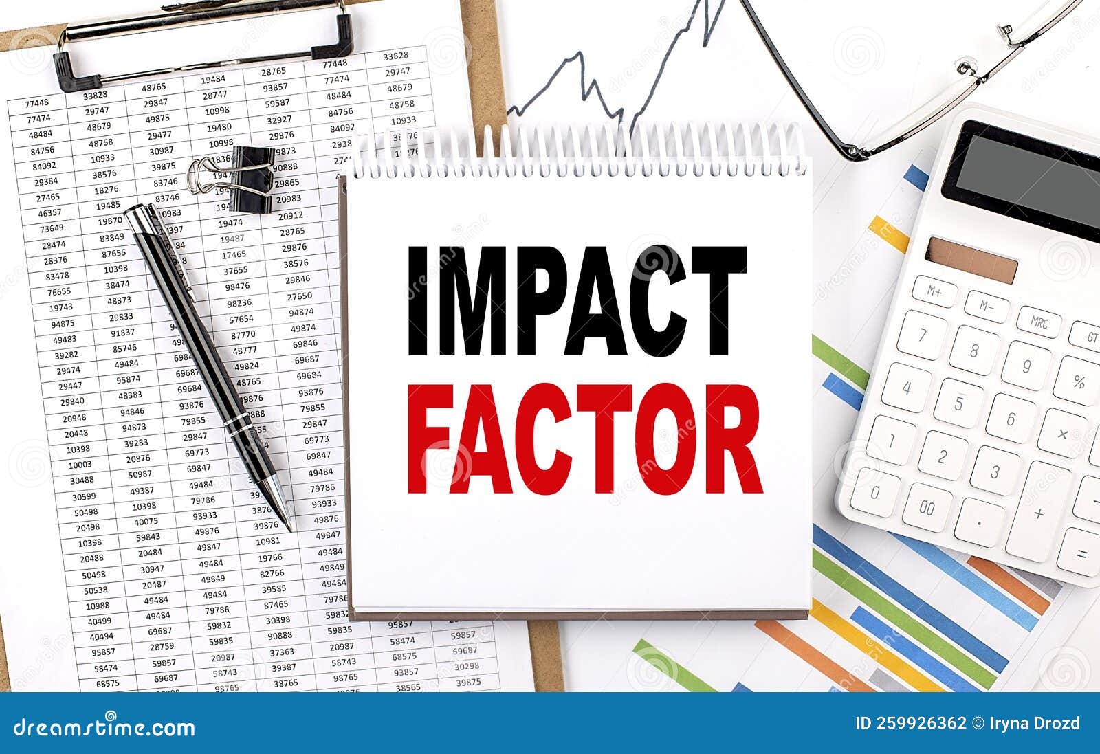 FLEXIBLE WORKING Text on Notebook with Chart, Calculator and Pen Stock ...