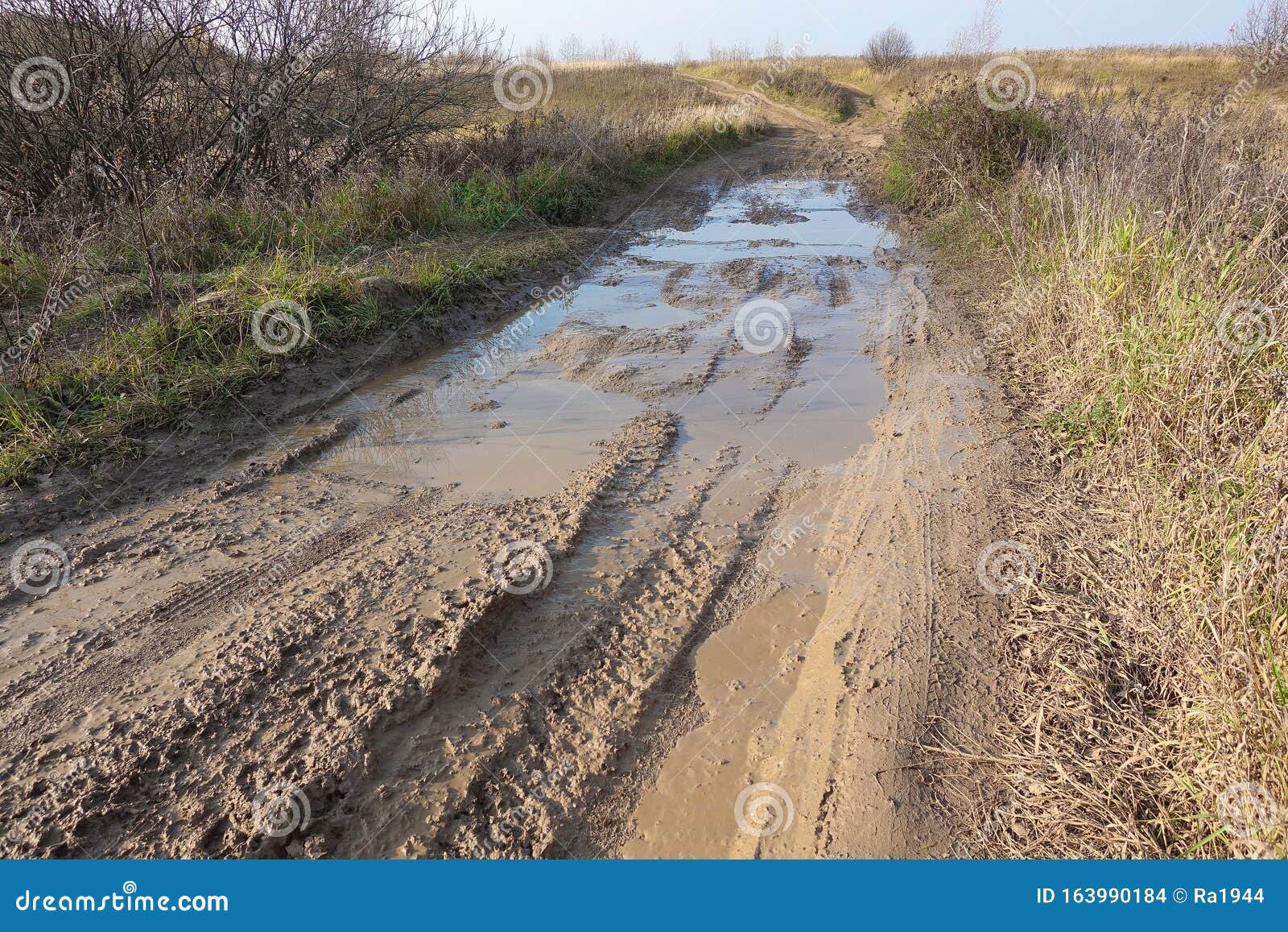 Impassable Dirt Road. Puddle and Dirt on the Road Stock Photo - Image ...