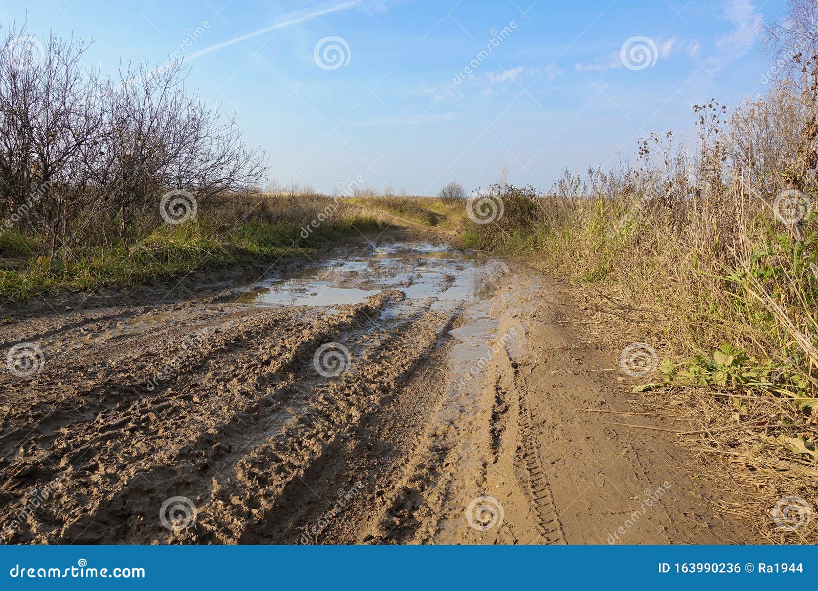 Impassable Dirt Road. Puddle and Dirt on the Road Stock Photo - Image ...