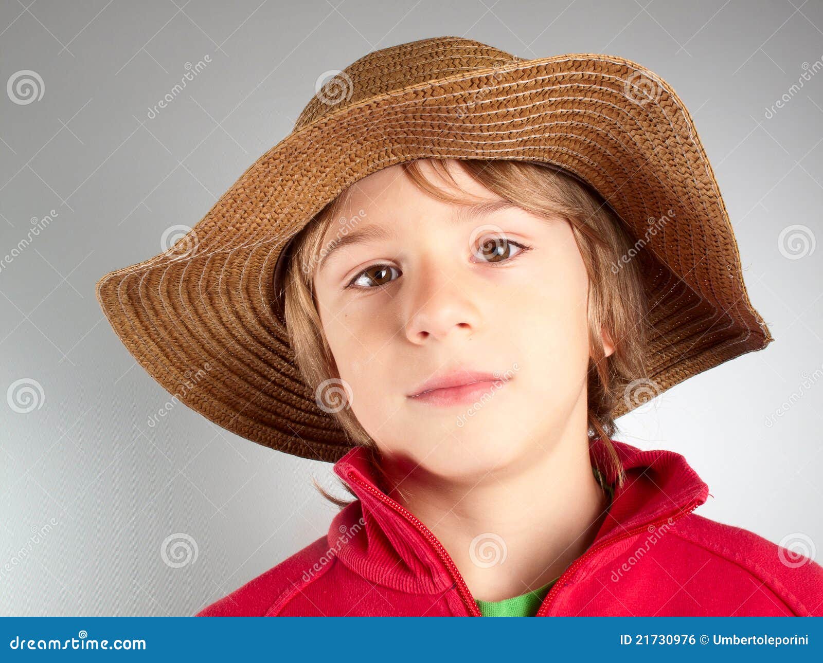 Impassive Child with Straws Hat Stock Photo - Image of child, superior ...