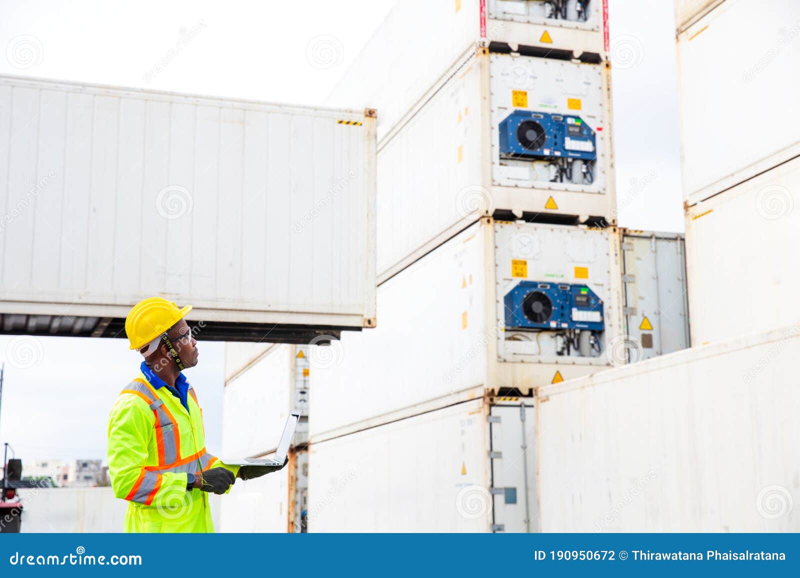 Import and Export Concept. Foreman Using Laptop Computer in the Port of ...
