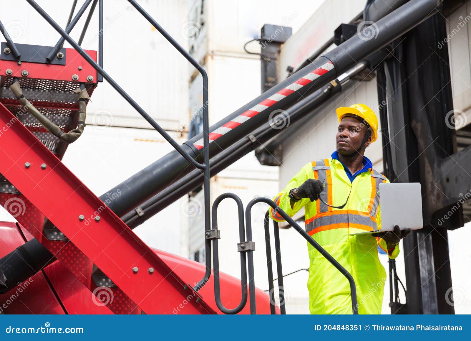Import and Export Concept. Foreman Using Laptop Computer in the Port of ...