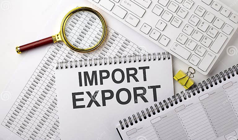IMPORT EXPORT Text Written on a Notebook on Chart with Keyboard and ...