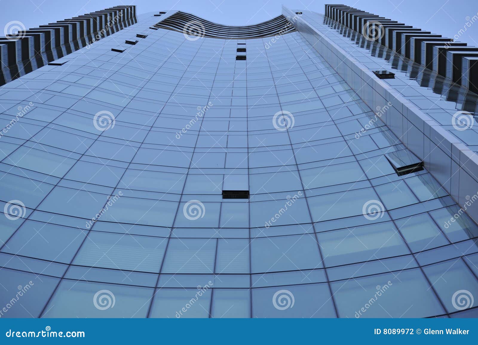 Imposing Blue Tinged Glass Skyscraper Stock Photo - Image of panes ...