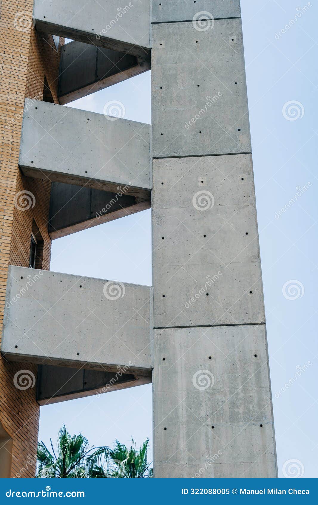 Imposing Brutalist Architecture Building Under A Clear Blue Sky. This ...