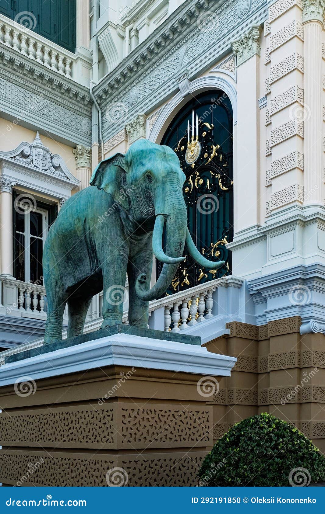 An Imposing Statue of an Elephant Commands Attention As it Rests upon ...