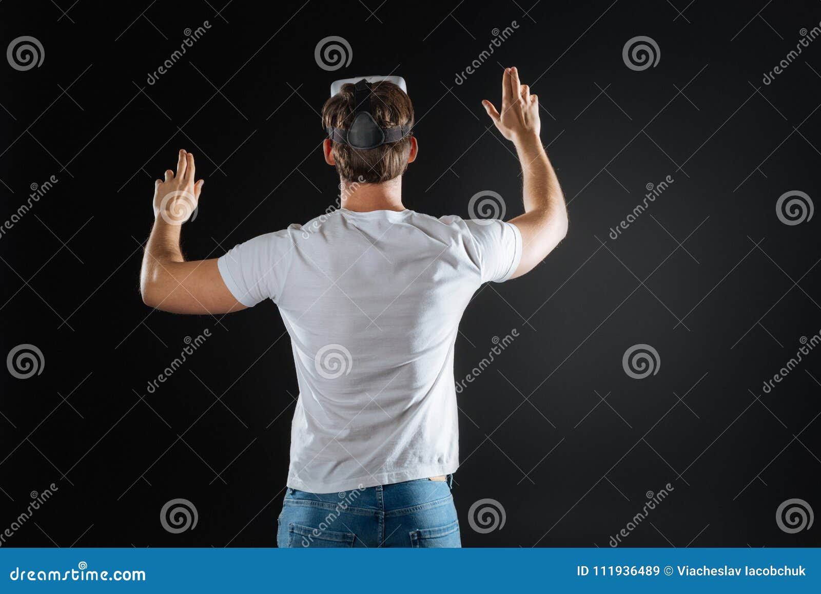 Impressed Curious Man Standing and Using VR Glasses. Stock Image ...