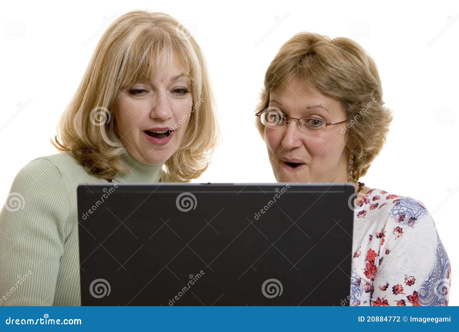 Impressed Women Looking at Computer Screen Stock Photo - Image of happy ...