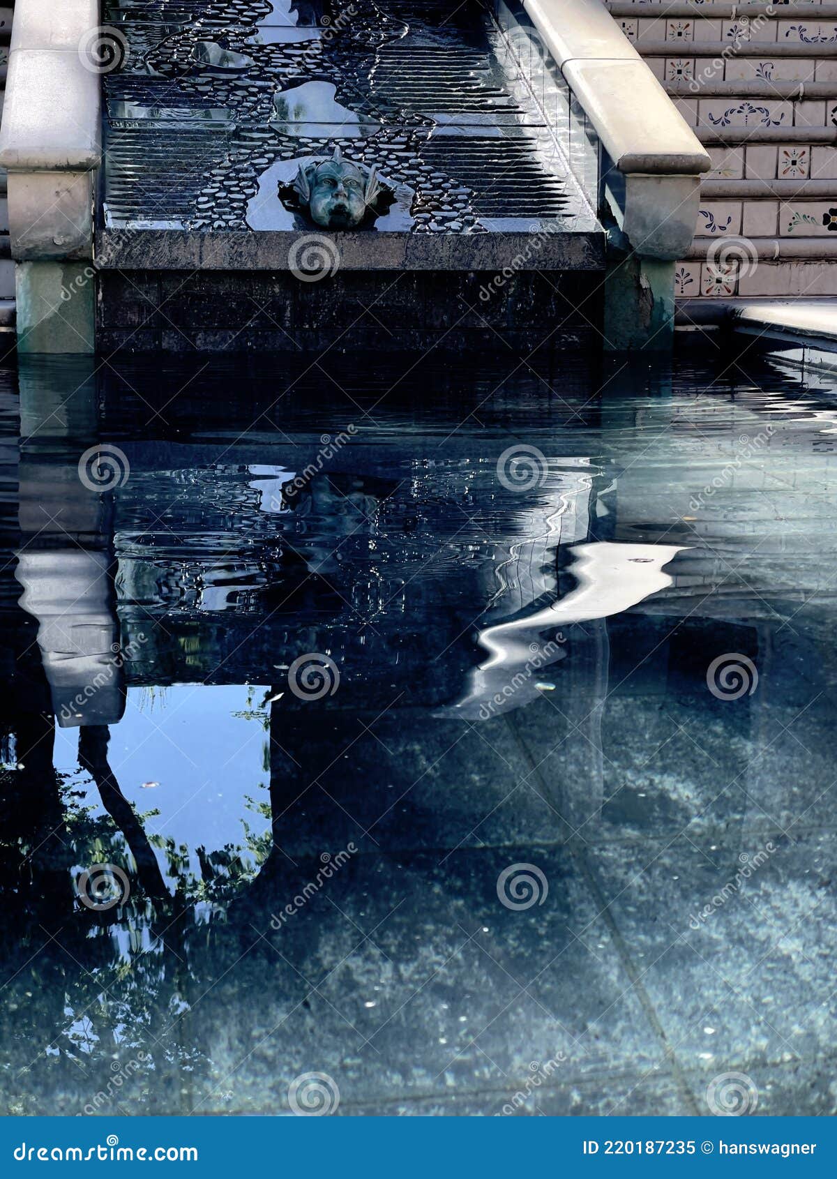 Impressionistic Photo of Small Gargoyle in a Water Fountain with a ...