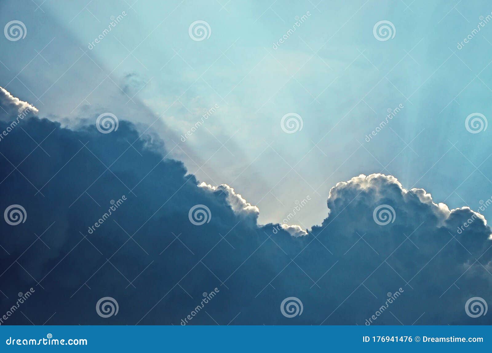 Impressive Sky With Sun Rays Seep Through Clouds During Sunrise Stock ...