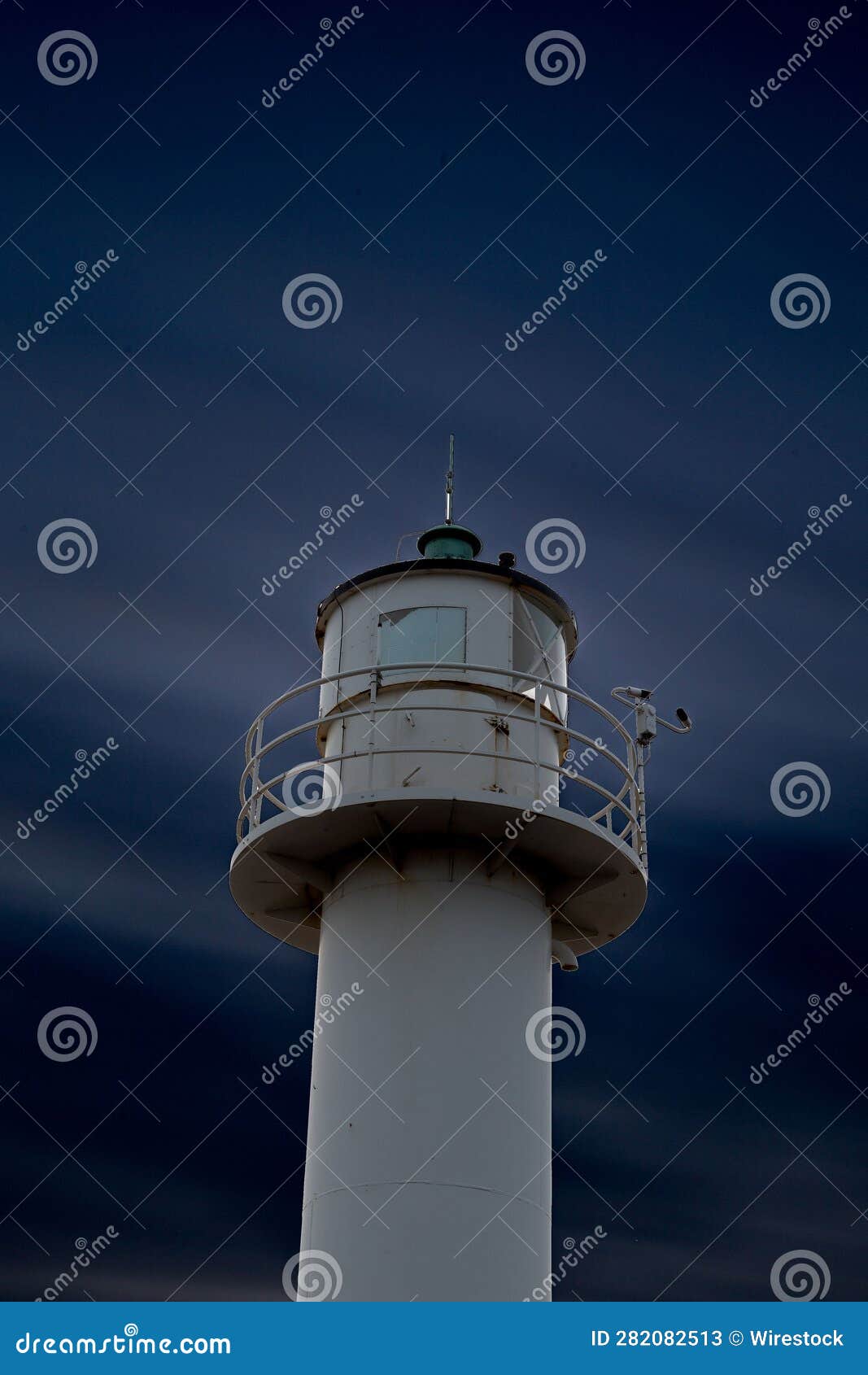Impressive Lighthouse Tower Rising High Against a Cloudy Sky Stock ...