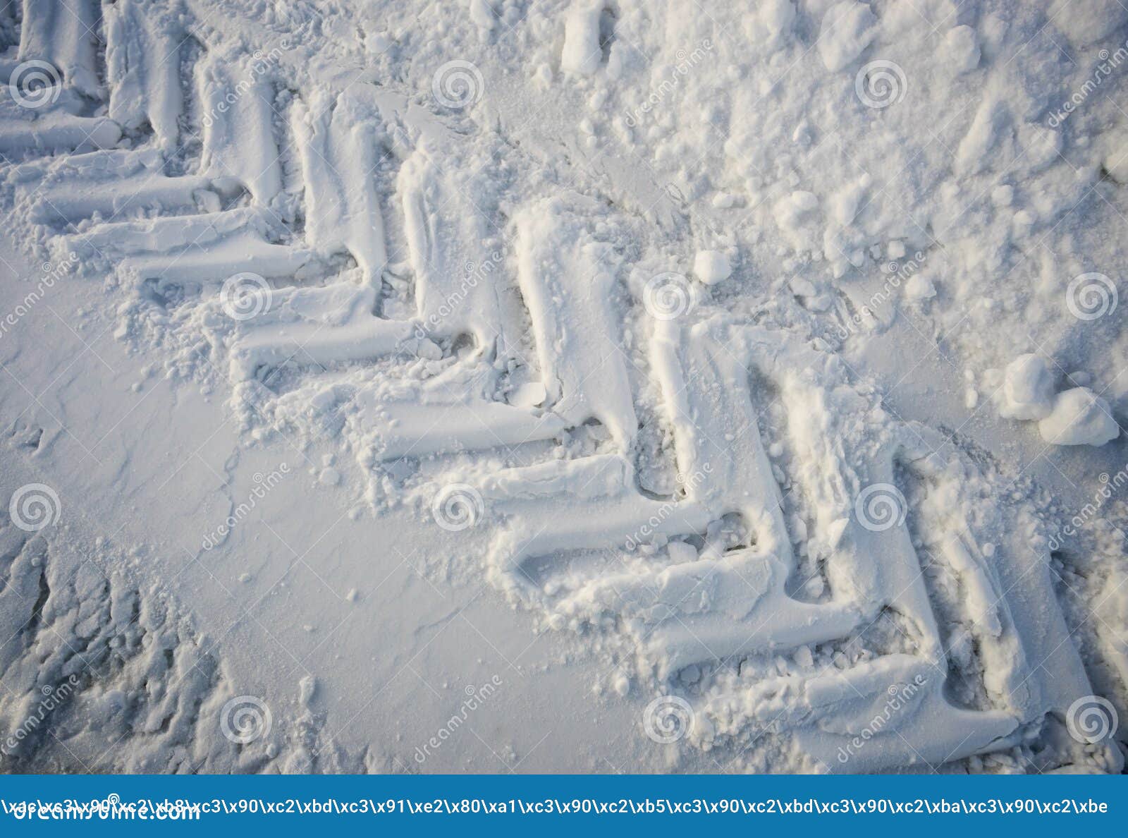 The Imprint Tread of Tractor Wheels in Snow. Stock Image - Image of ...