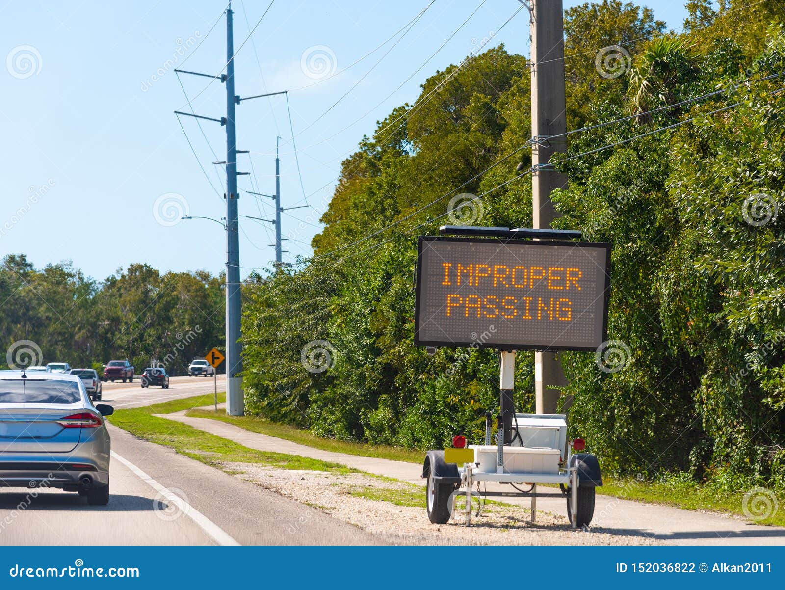 Improper Passing Written on a Solar Powered Mobile Road Sign Stock ...
