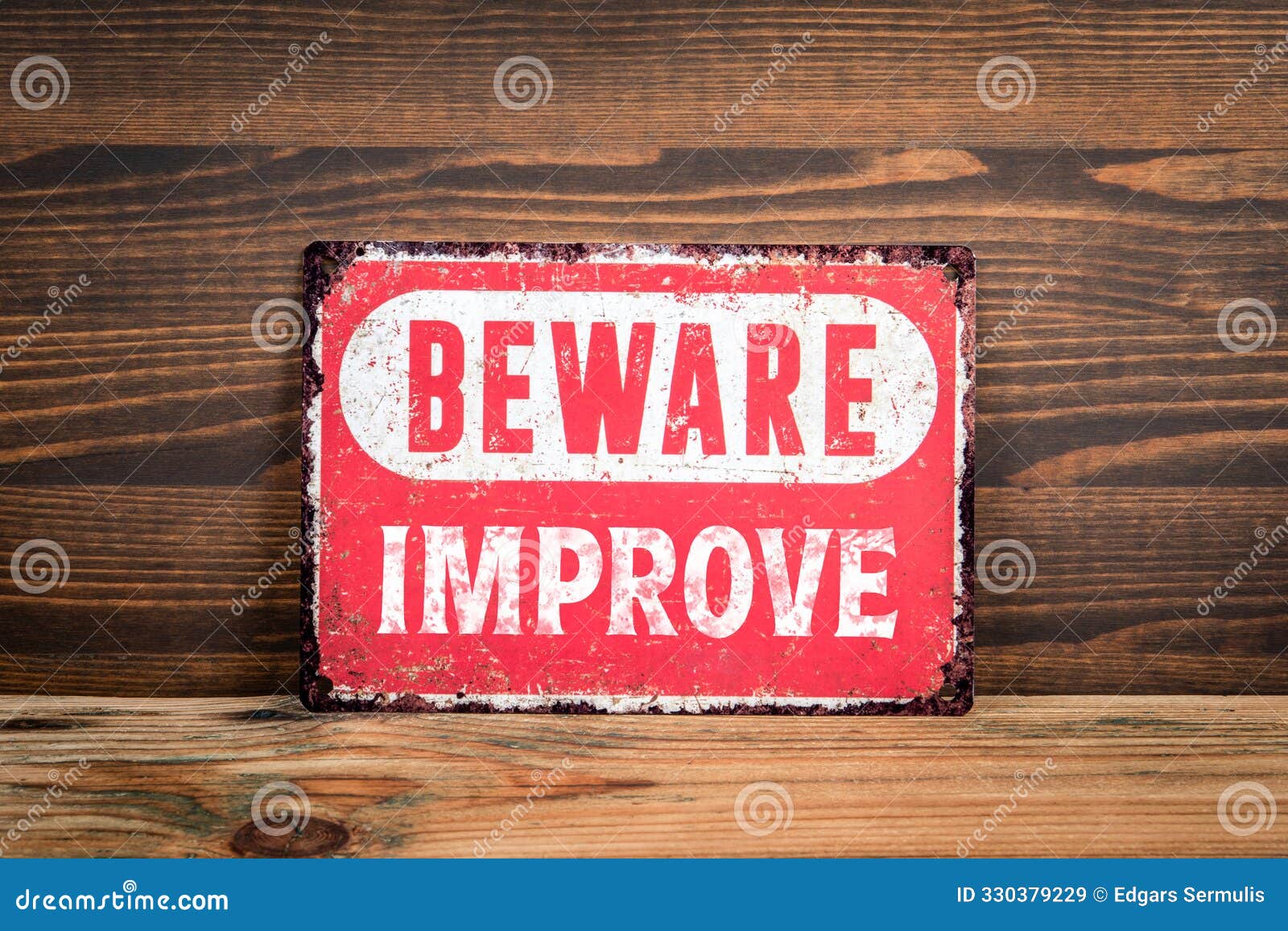 Improve. Beware Sign with Text on a Wooden Texture Office Table Stock ...