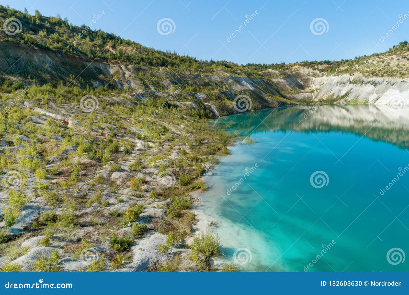 Inactive Gypsum Quarry. in the Quarry is a Lake with Blue Water Stock ...