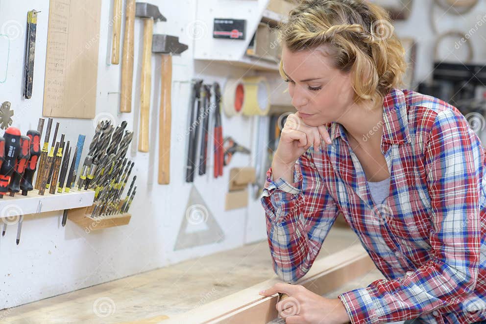 Inactive Woman Sat at Workbench Stock Photo - Image of capentry ...