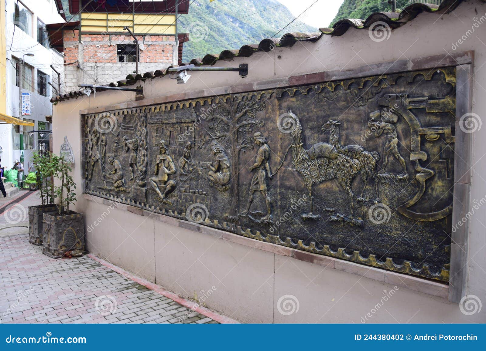 Inca Bas-reliefs on the Wall in Aguas Calientes, Peru Editorial ...