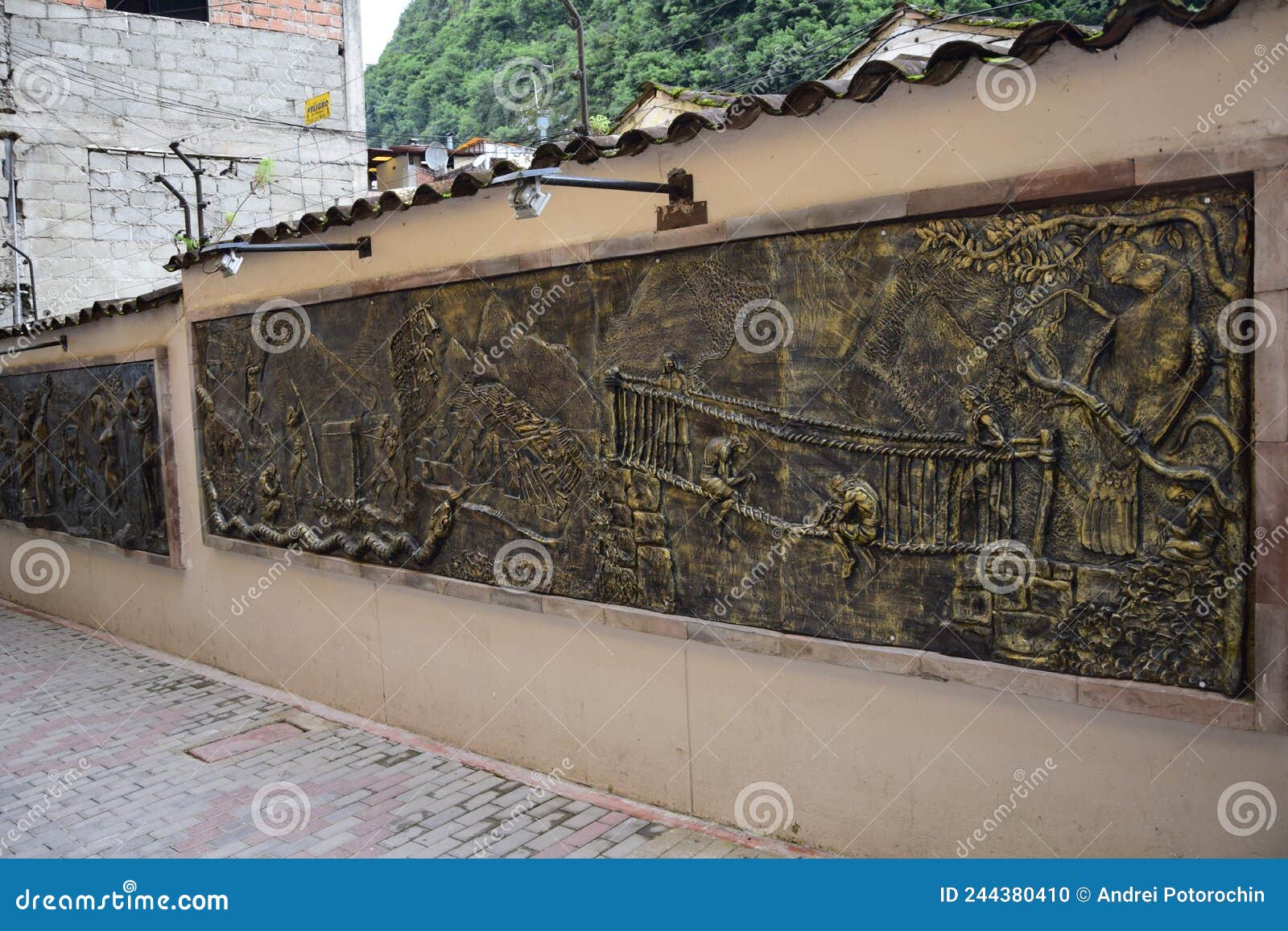 Inca Bas-reliefs on the Wall in Aguas Calientes, Peru Stock Photo ...
