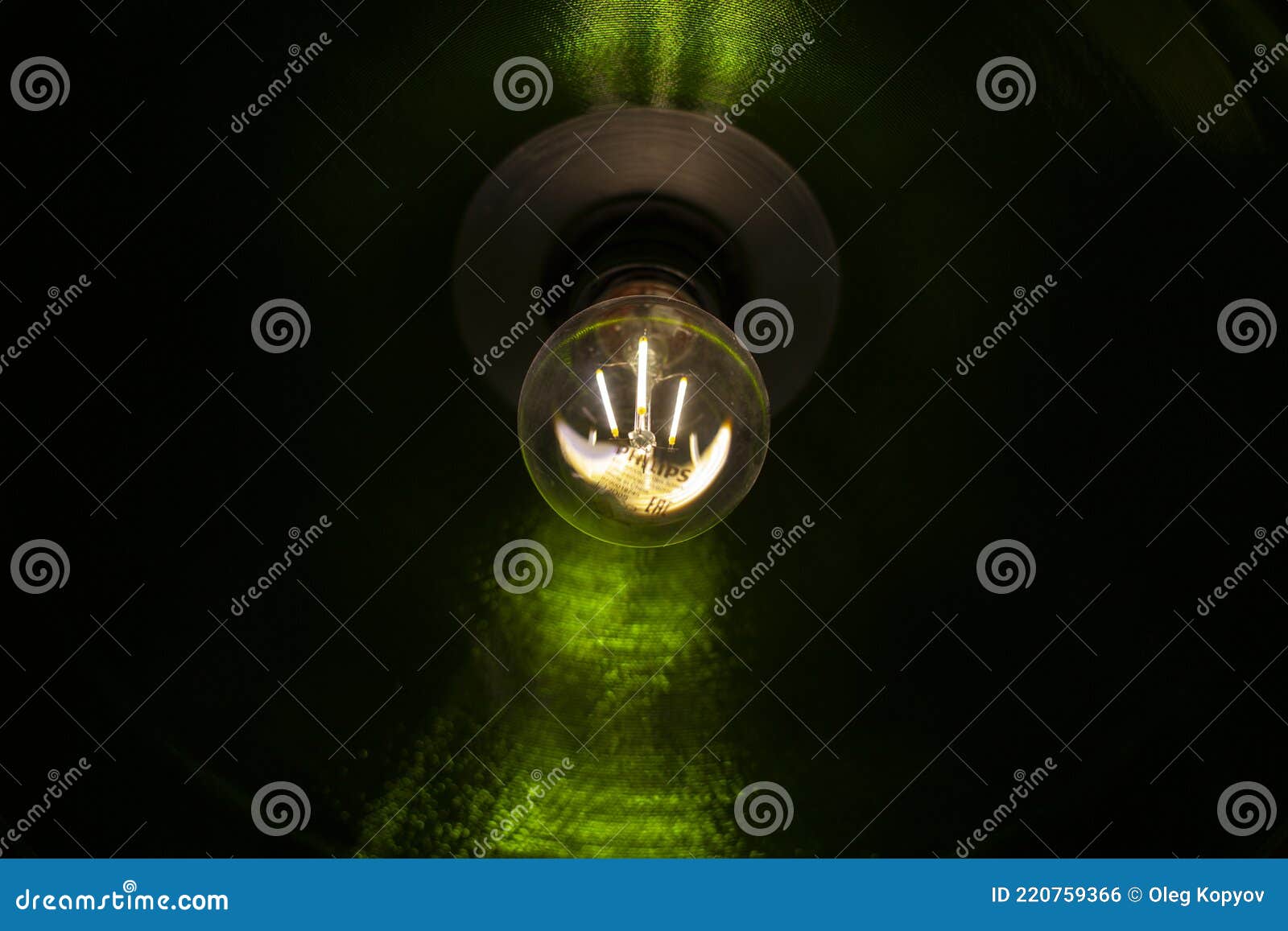 Incandescent Lamp in the Dark. Heating Filament in the Lamp Stock Photo ...
