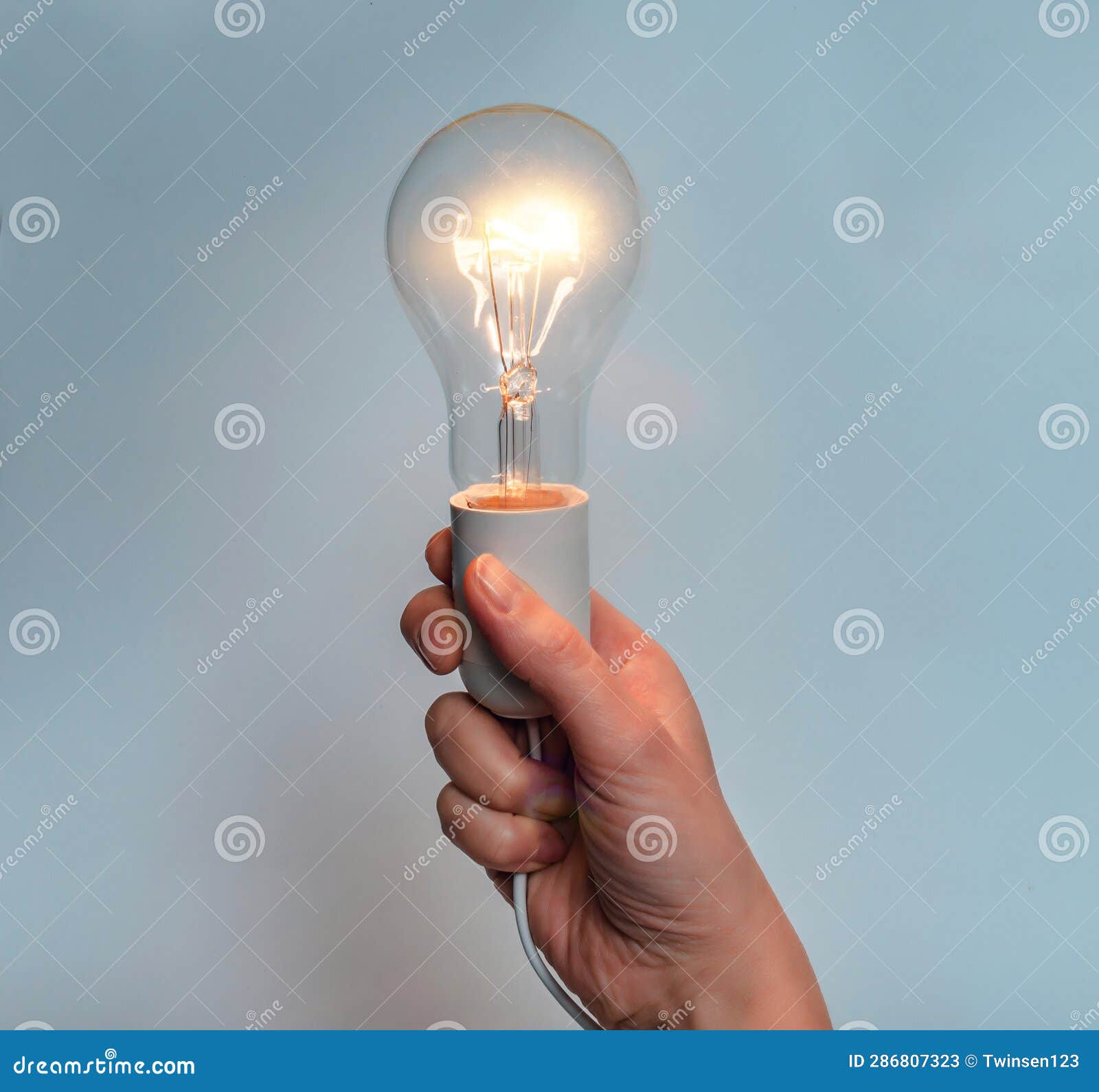 An Incandescent Lamp Shines in a Person S Hand Stock Image - Image of ...