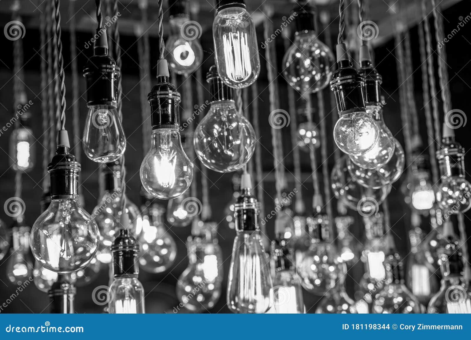 Incandescent Light Bulb Chandelier Array Hanging from the Ceiling Stock ...