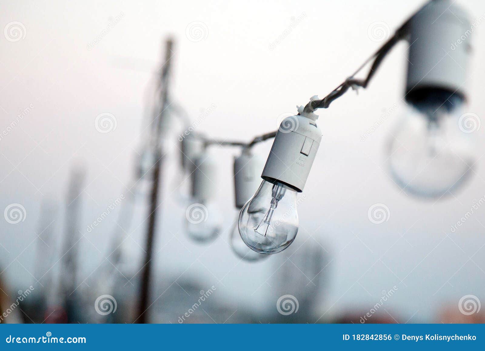 Incandescent Light Bulb on Wire Stock Photo - Image of illumination ...