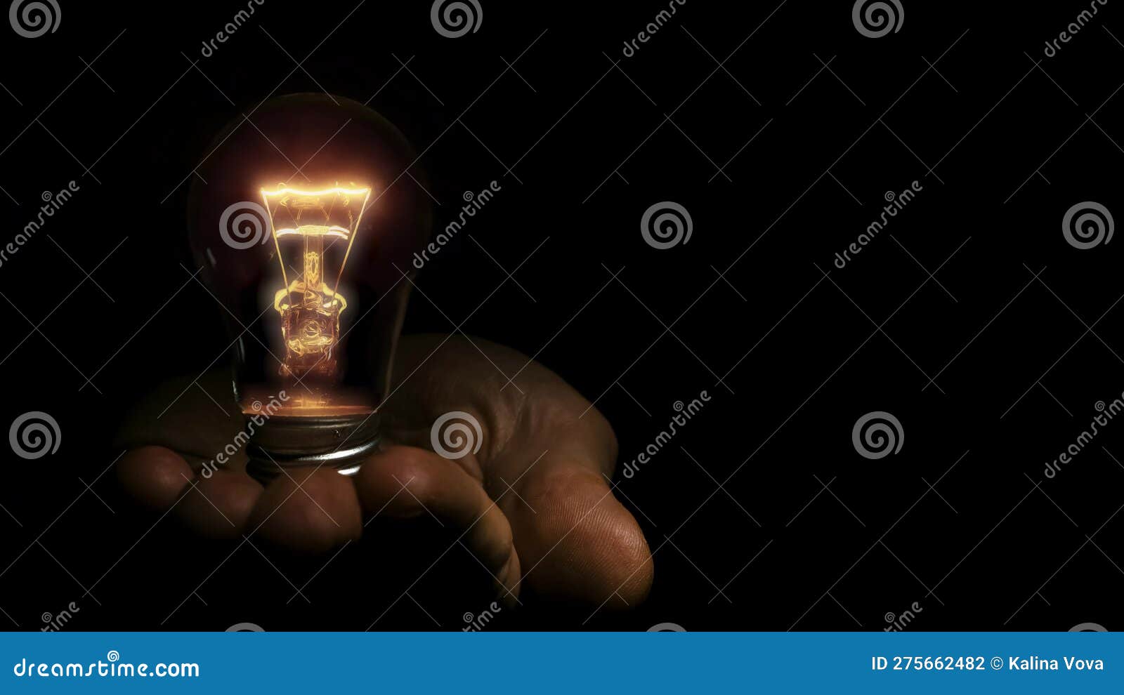 Incandescent Light with Voltage Drop Bulb on Black Background Stock ...