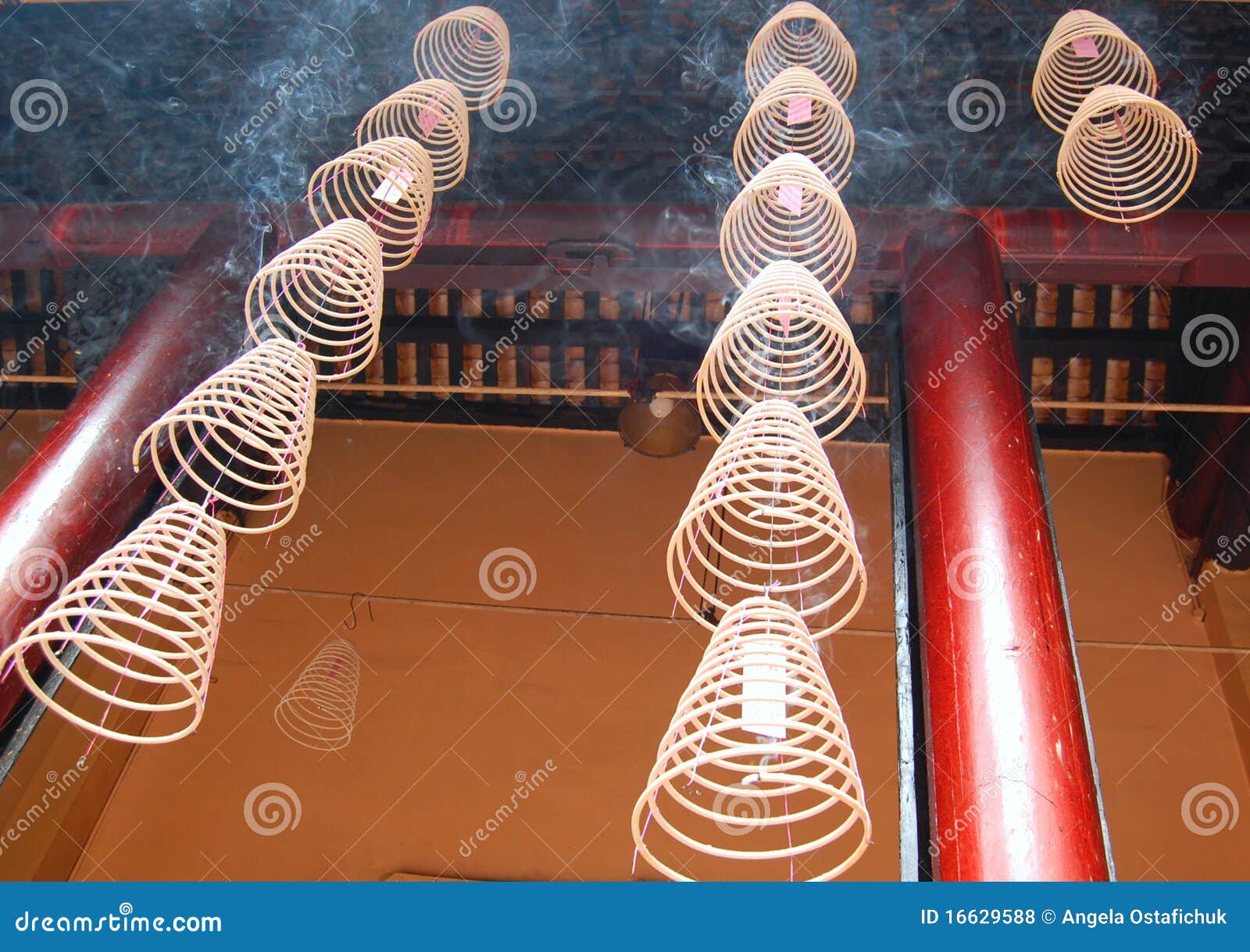 Incense coils in a temple stock photo. Image of tradition - 16629588