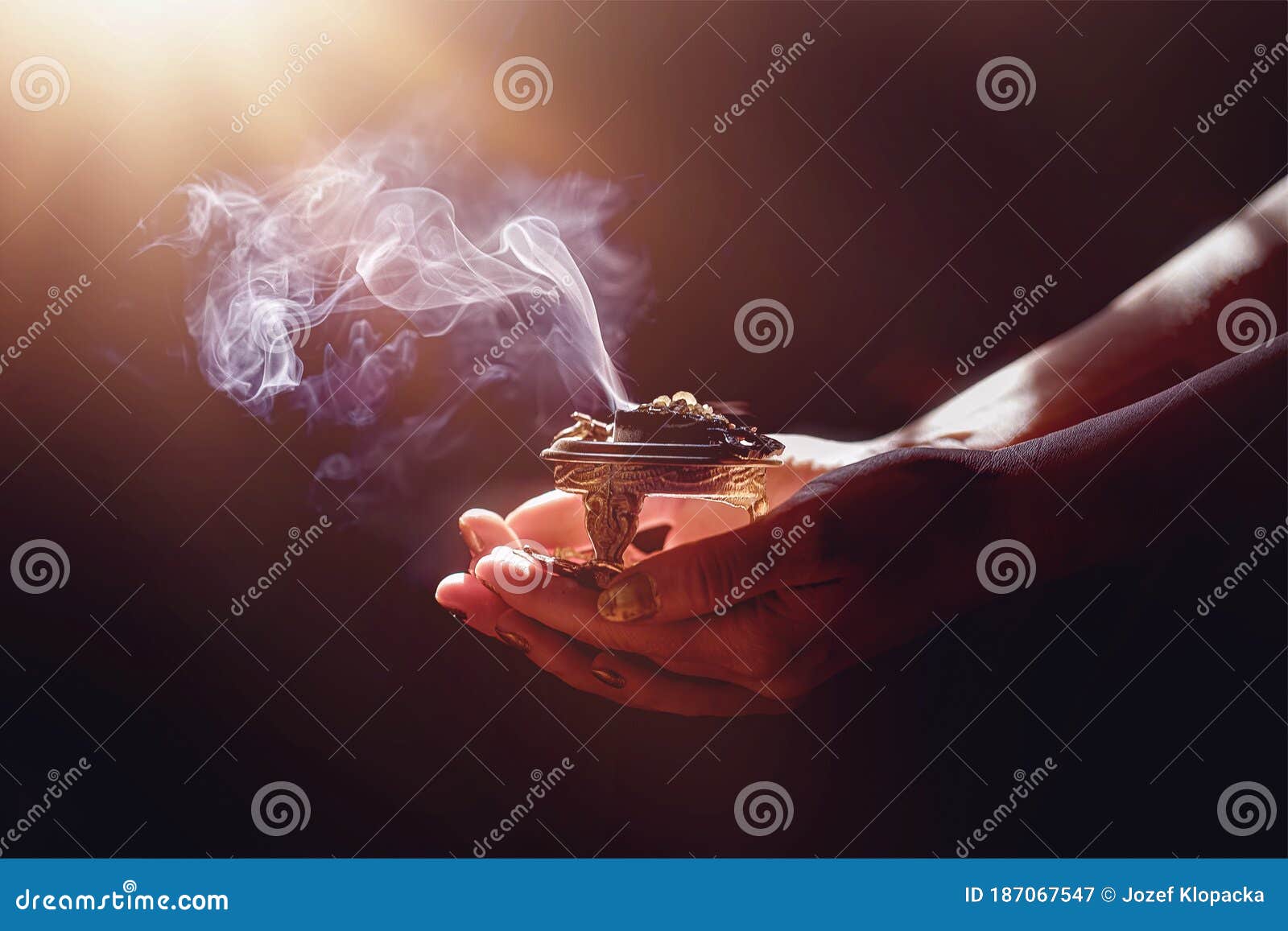 Incense in a Woman Hand, Incense Smoke on a Black Background. Stock ...