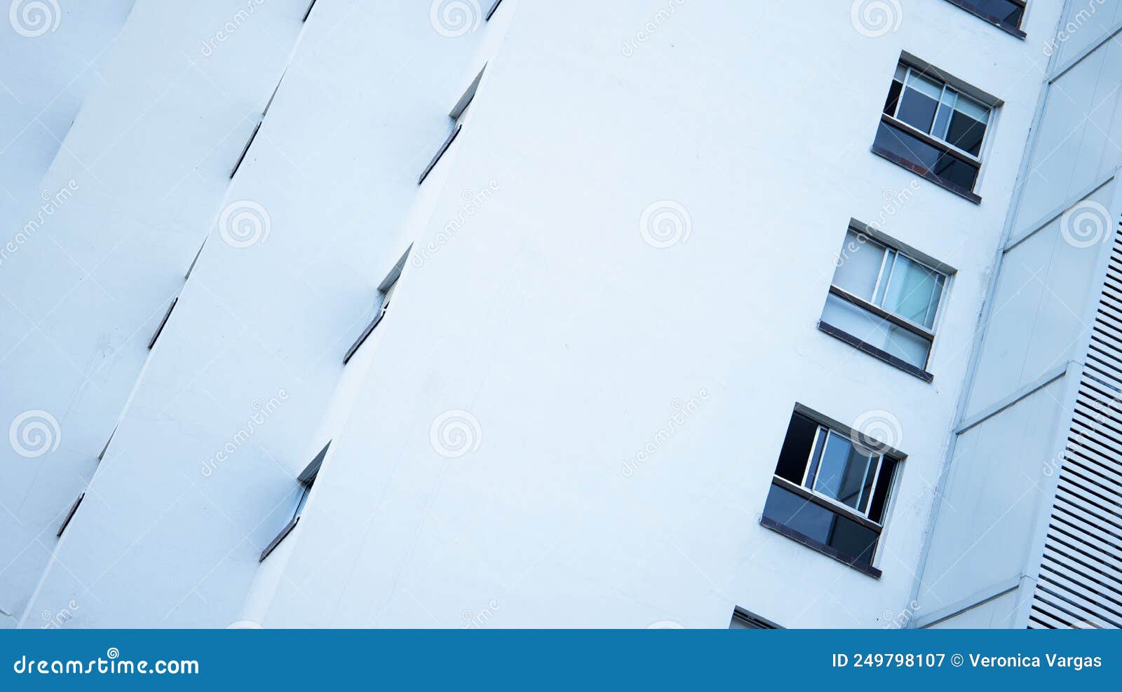 Inclined Building Facade with Windows Stock Image - Image of modern ...