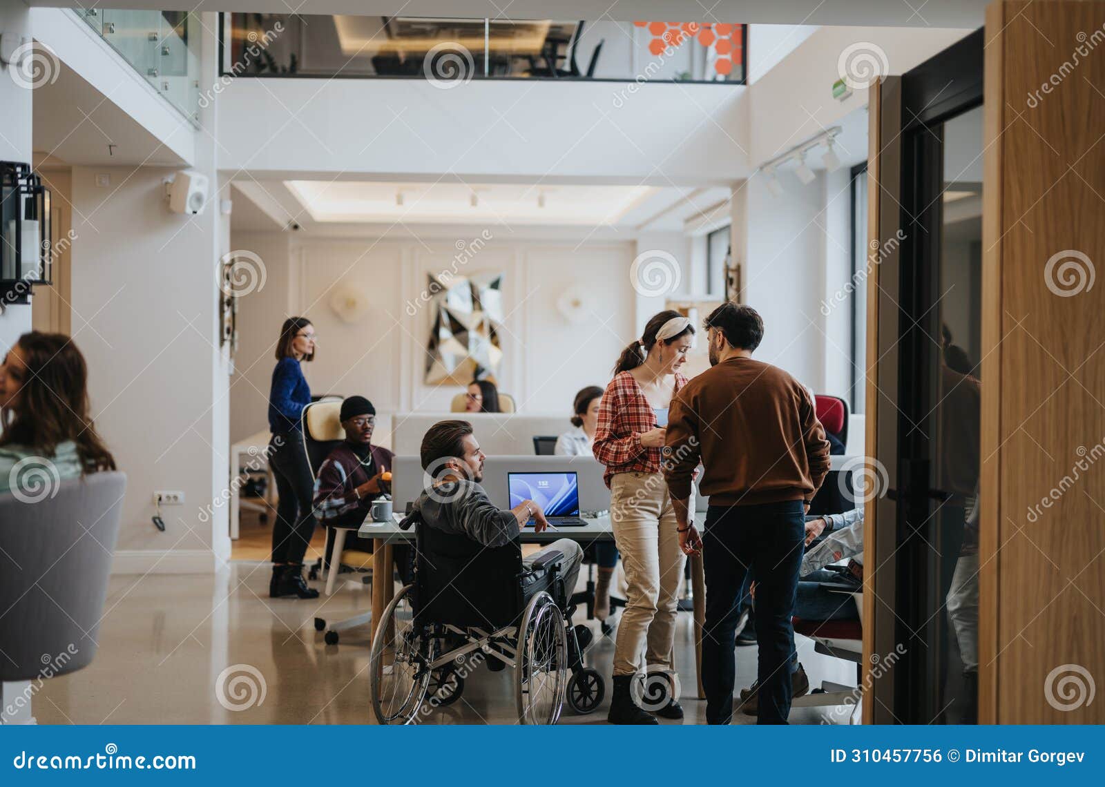 Inclusive Modern Office Environment with Diverse Team Engaging in ...