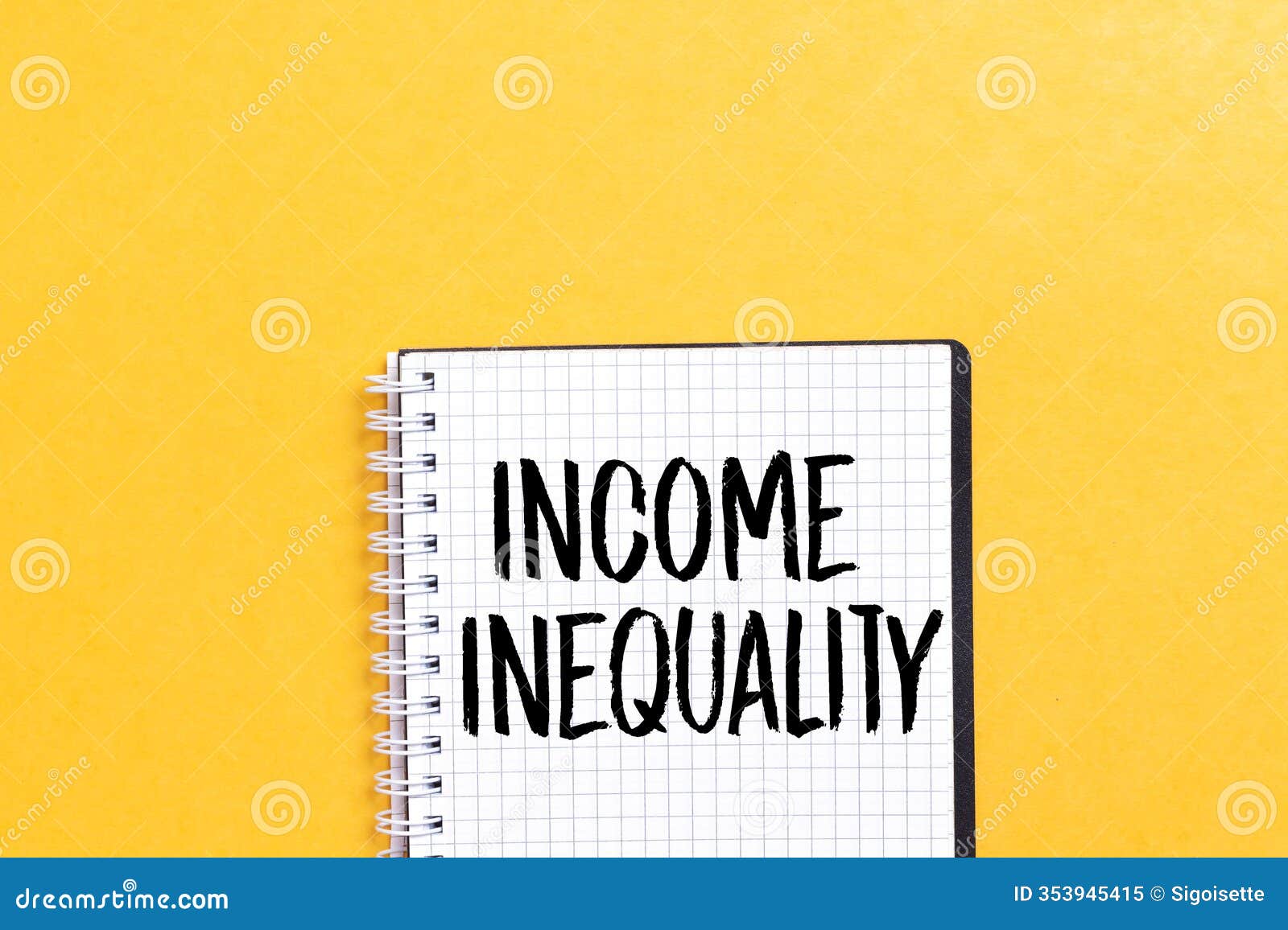 Income Inequality Concept Depicted on Notebook with Yellow Background ...