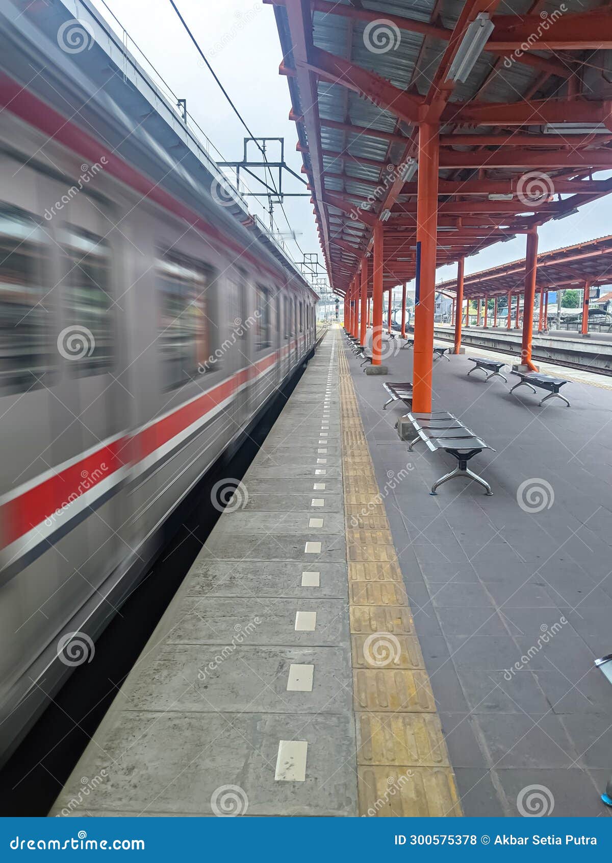 Incoming commuter trains stock photo. Image of industrial - 300575378