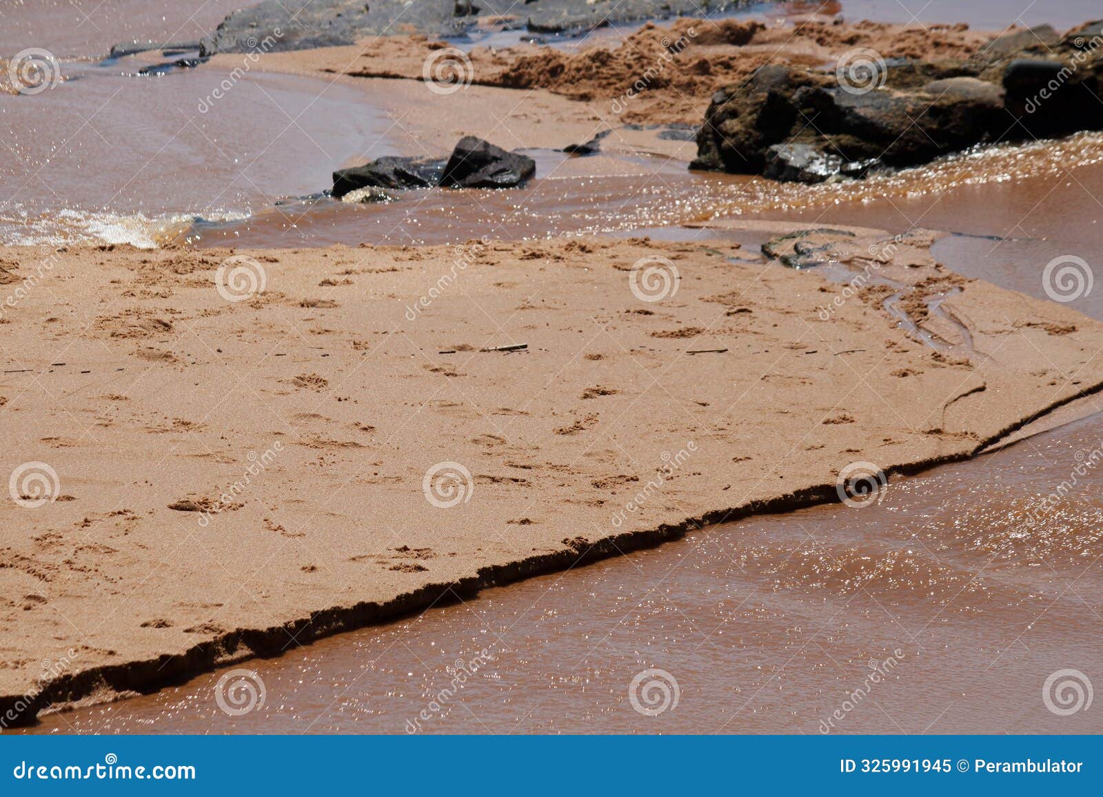 INCOMING HIGHTIDE CUTTING into BEACH SAND Stock Image - Image of ...