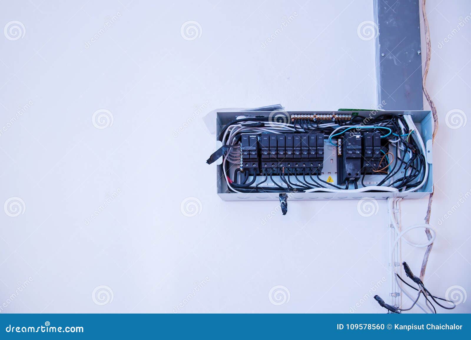 Incomplete Electrical Control Box on the White Wall. Maintenance and ...