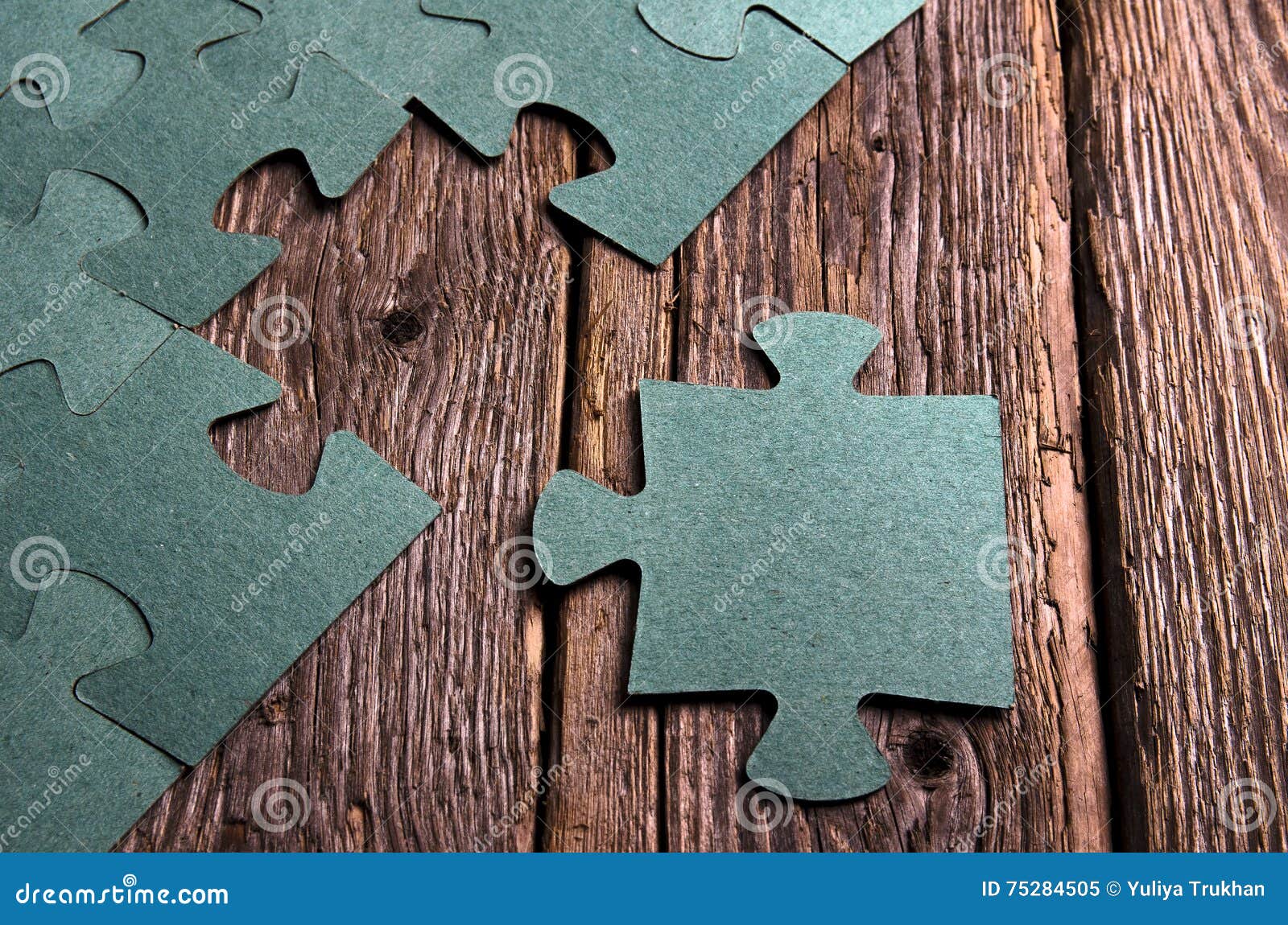 Incomplete Puzzles Lying on Wooden Rustic Boards. Stock Image - Image ...