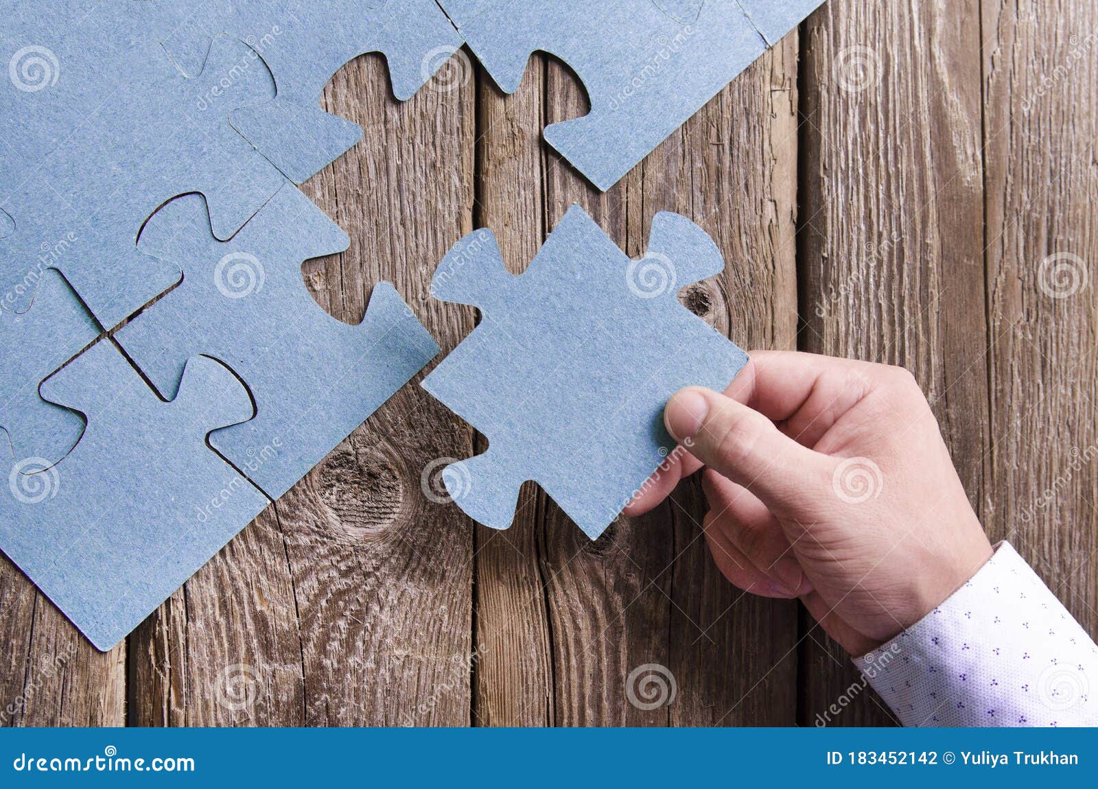 Incomplete Puzzles Lying on Wooden Rustic Boards. Stock Photo - Image ...