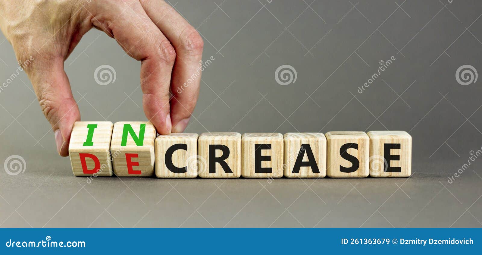 Increase or Decrease Symbol. Concept Words Increase and Decrease on Wooden Cubes. Businessman ...